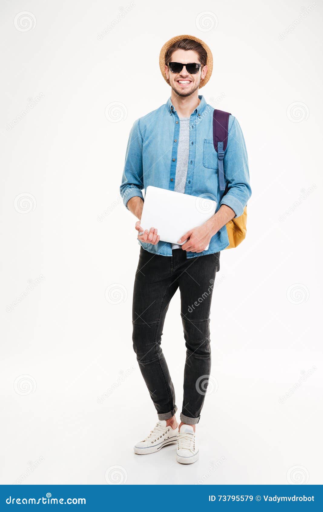 Smiling Young Man Holding Backpack and Laptop Stock Image - Image of ...