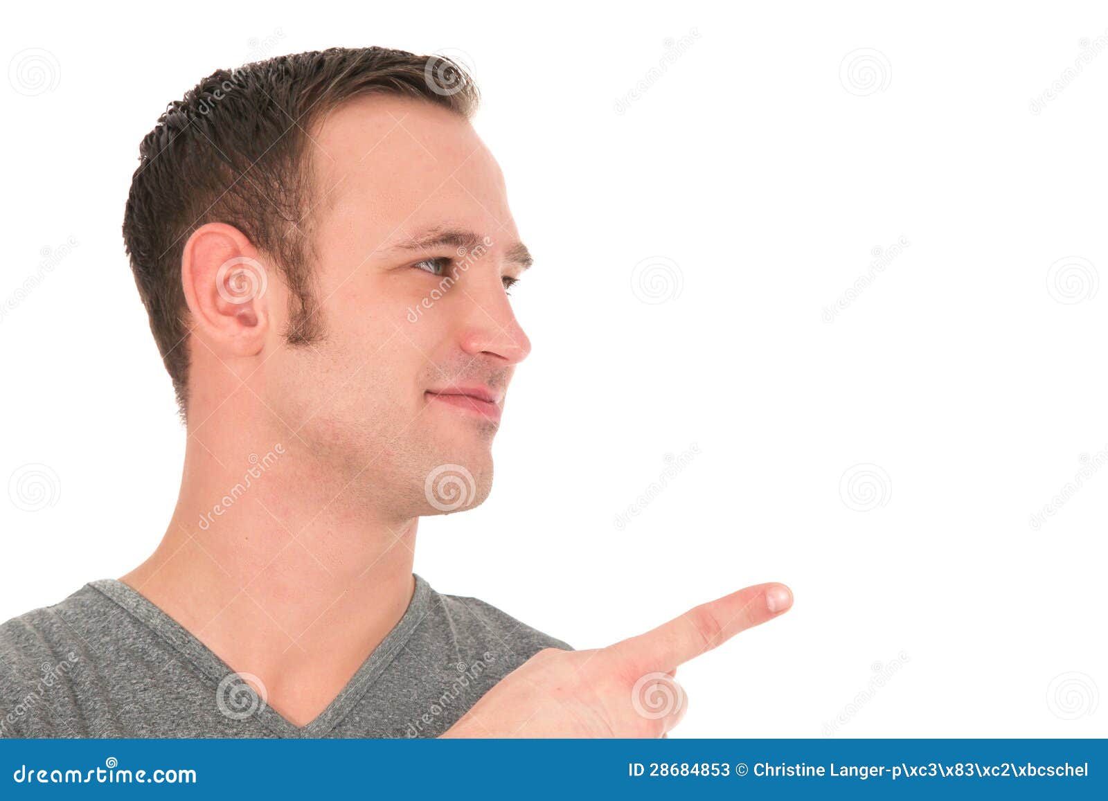 Smiling Young Man Pointing a Finger Stock Image - Image of posture ...