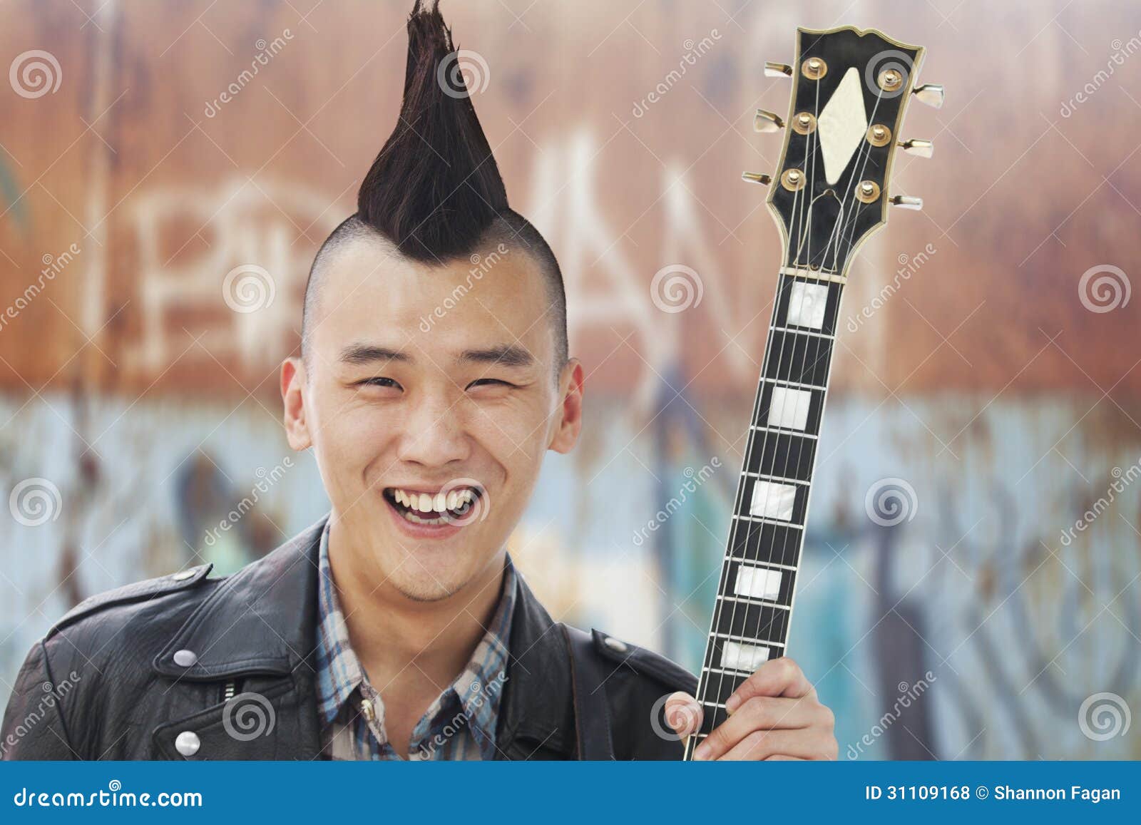 Smiling Young Man with Punk Mohawk Holding Guitar Stock Photo - Image ...