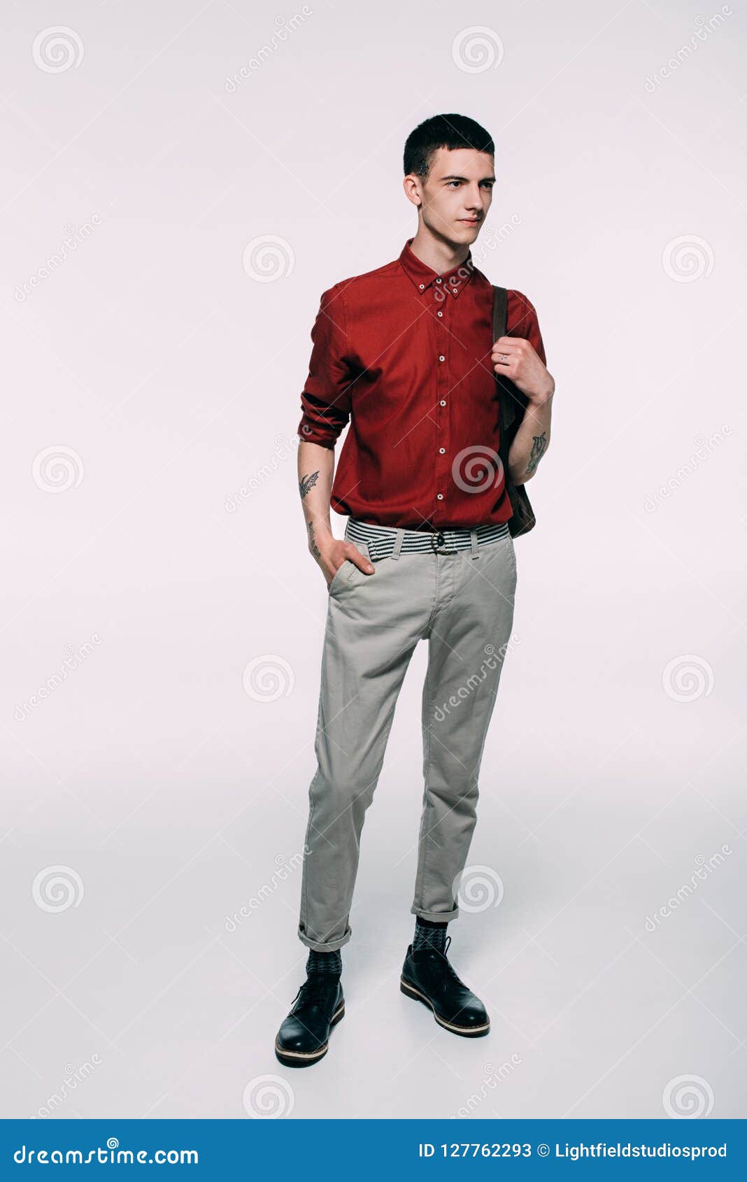 Smiling Young Man in Red Shirt Stock Image - Image of fulllength, shirt ...