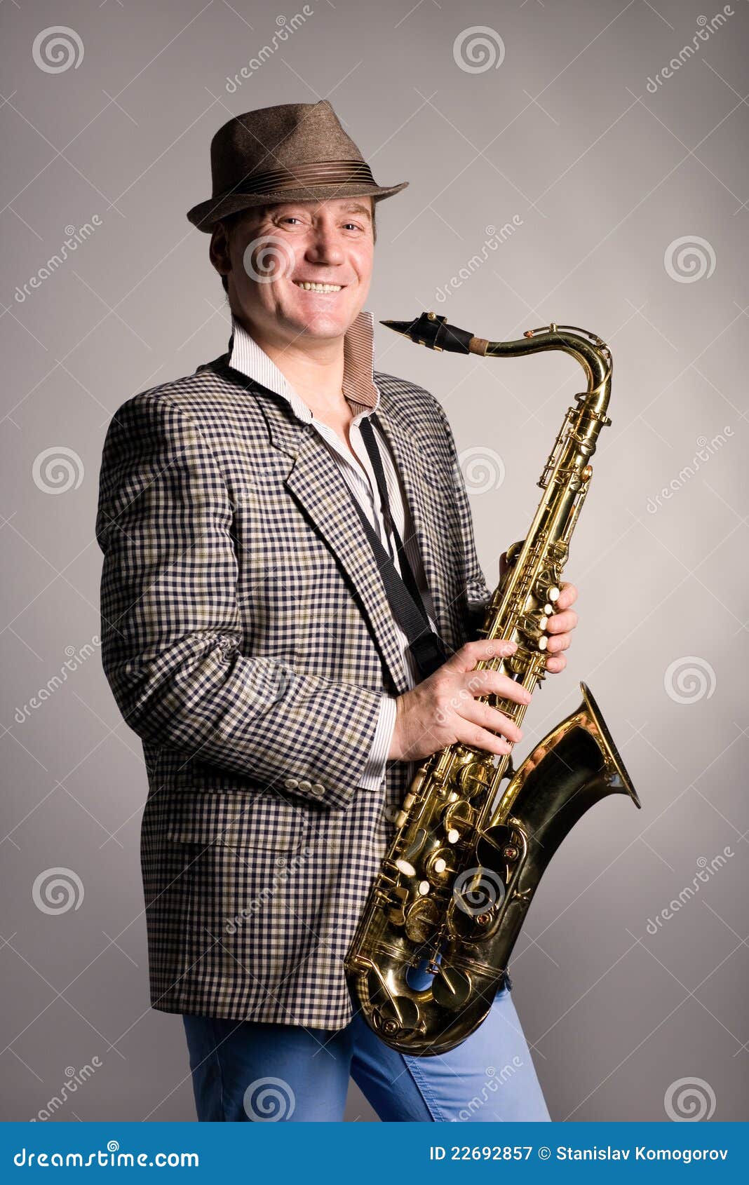 Smiling Young Man with a Saxophone. Stock Image - Image of portrait ...