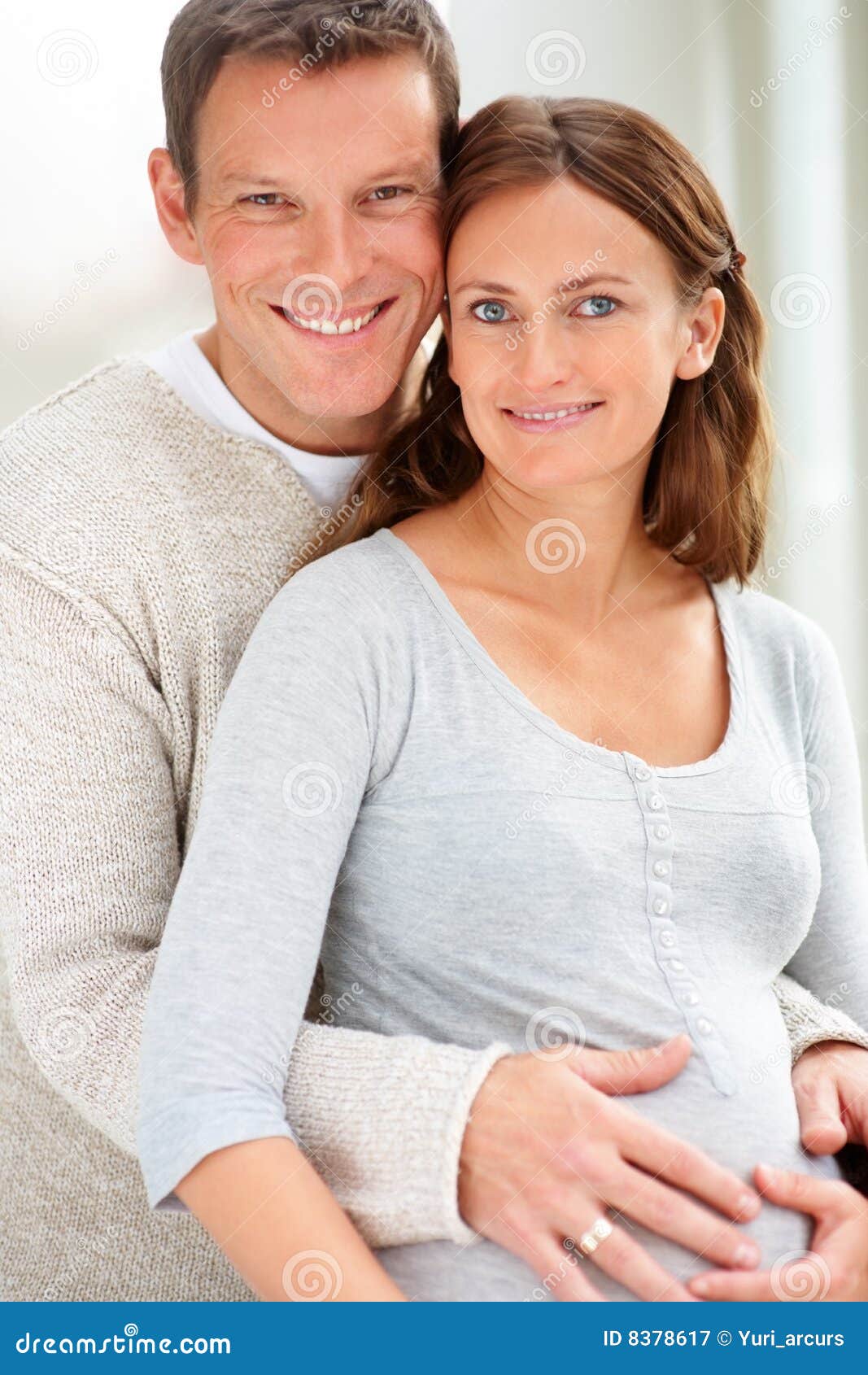 Smiling Young Man Standing with Her Expecting Wife Stock Image - Image ...