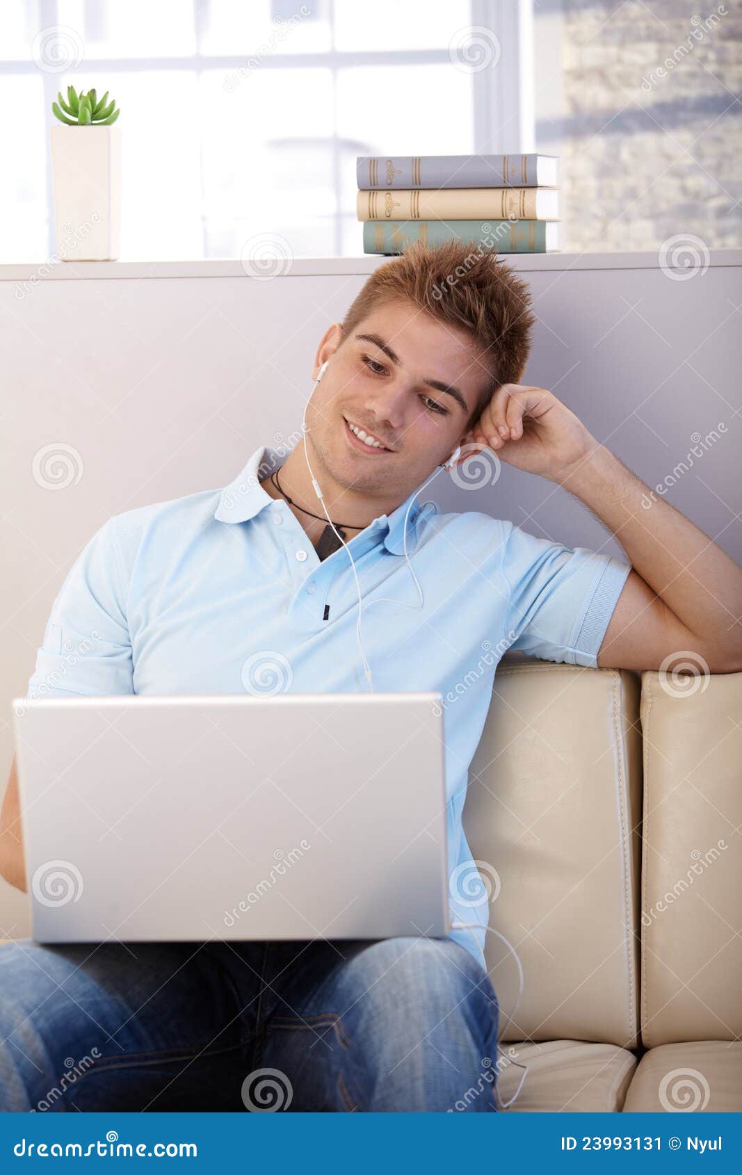Smiling Young Man Using Computer Stock Image - Image of adult, clothing ...