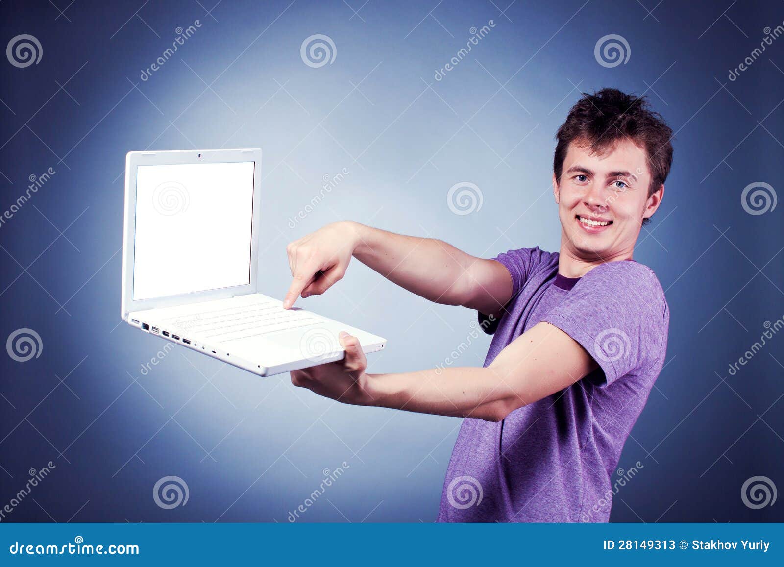 Smiling Young Man Using Laptop Stock Image - Image of jersey, smiling ...