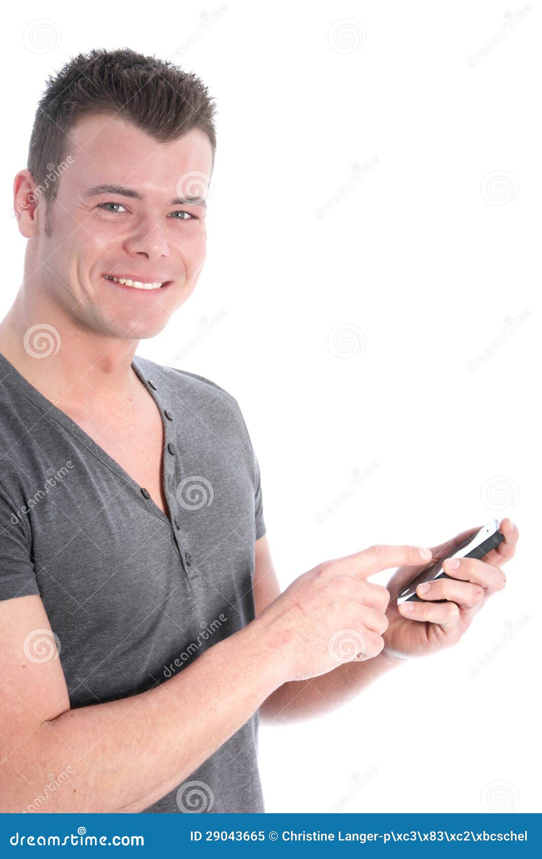Smiling Young Man Using a Smartphone Stock Image - Image of online ...