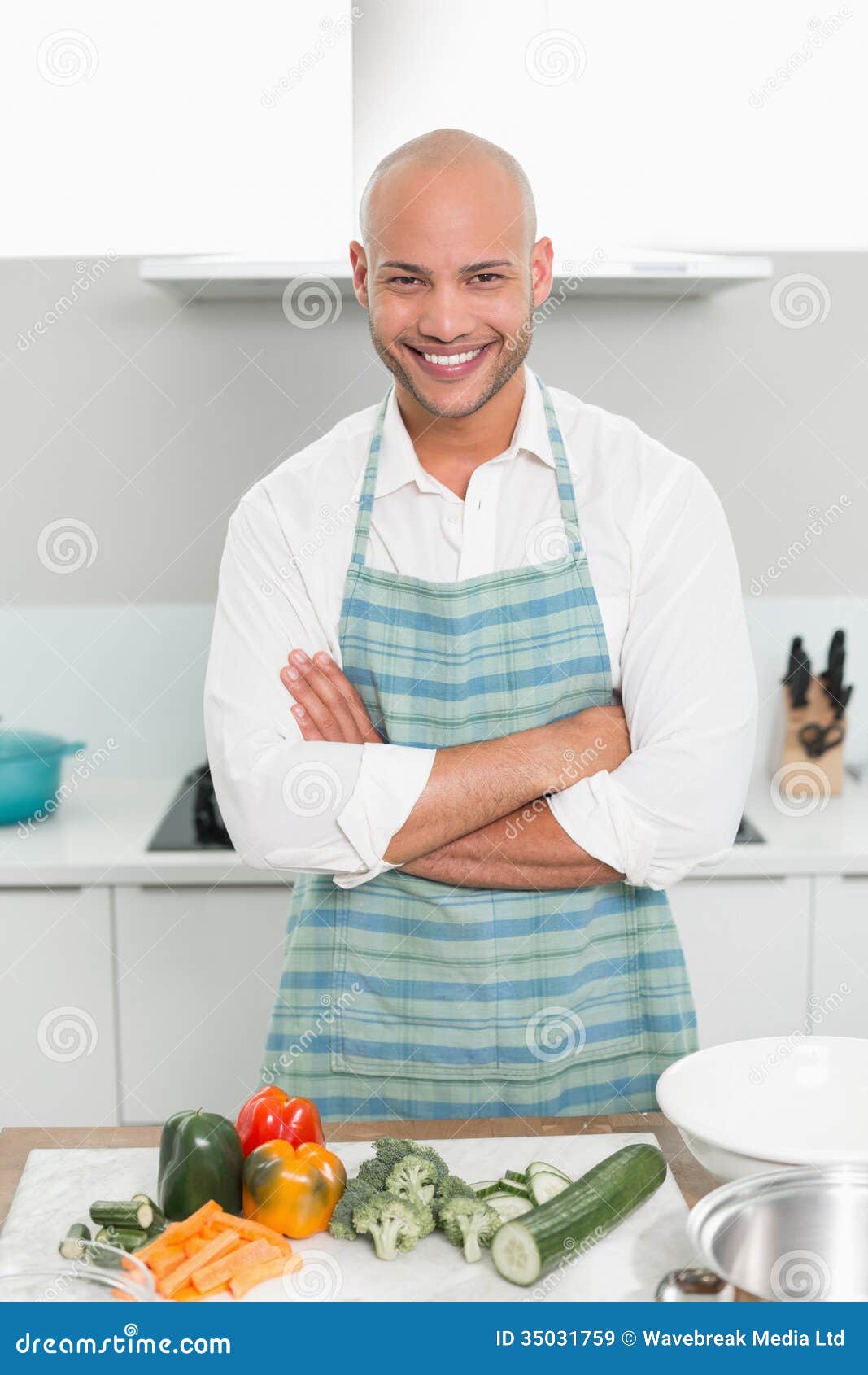 Smiling Young Man with Vegetables in Kitchen Stock Image - Image of ...
