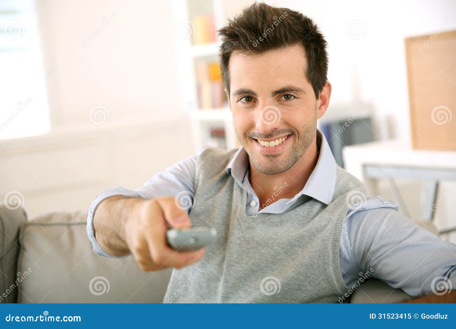 Smiling Young Man Watching Tv Stock Image - Image of handsome, remote ...