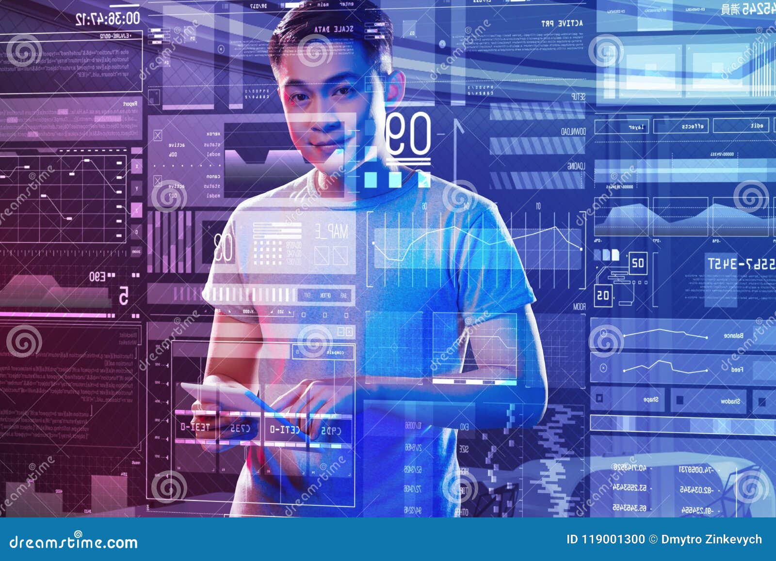 Handsome Young Man Standing with a Modern Gadget and Looking Calm Stock ...