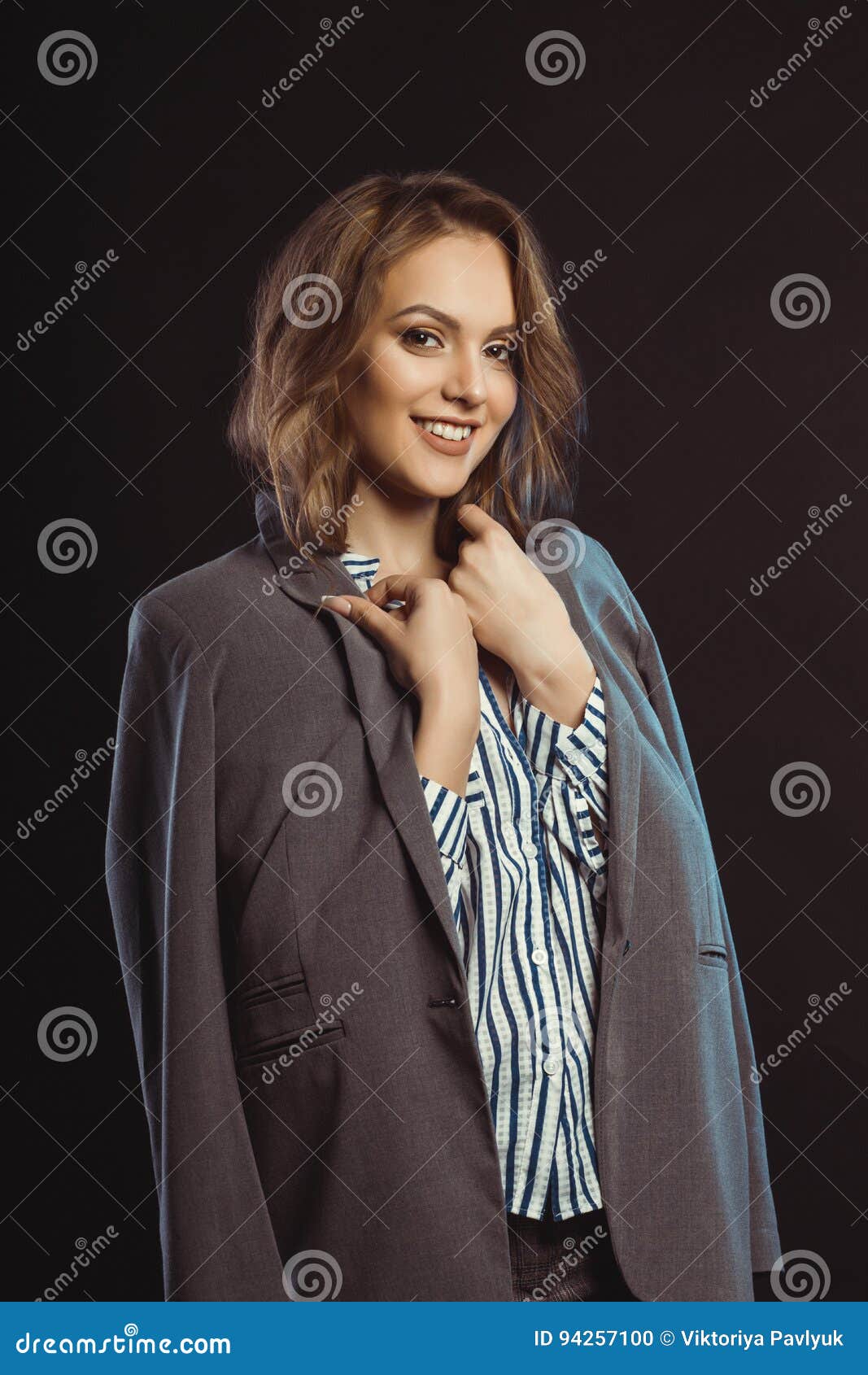 Smiling Young Model Posing in Shirt and Grey Jacket Stock Photo - Image ...