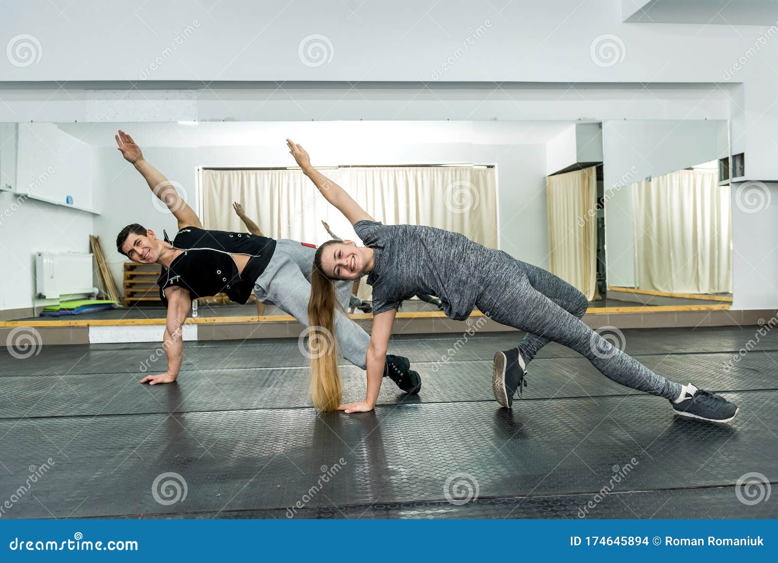 Smiling Young People Doing Exercises in Gym Stock Photo - Image of club ...