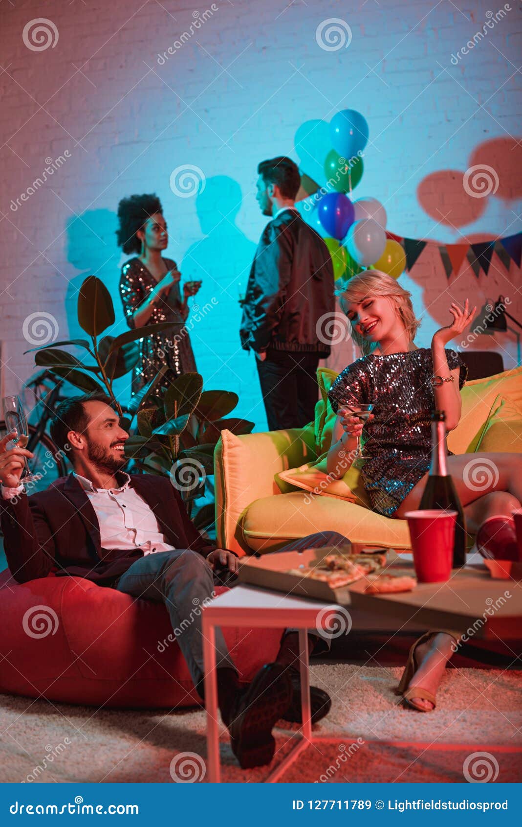 Smiling Young People Enjoying Drinks and Talking Stock Image - Image of ...