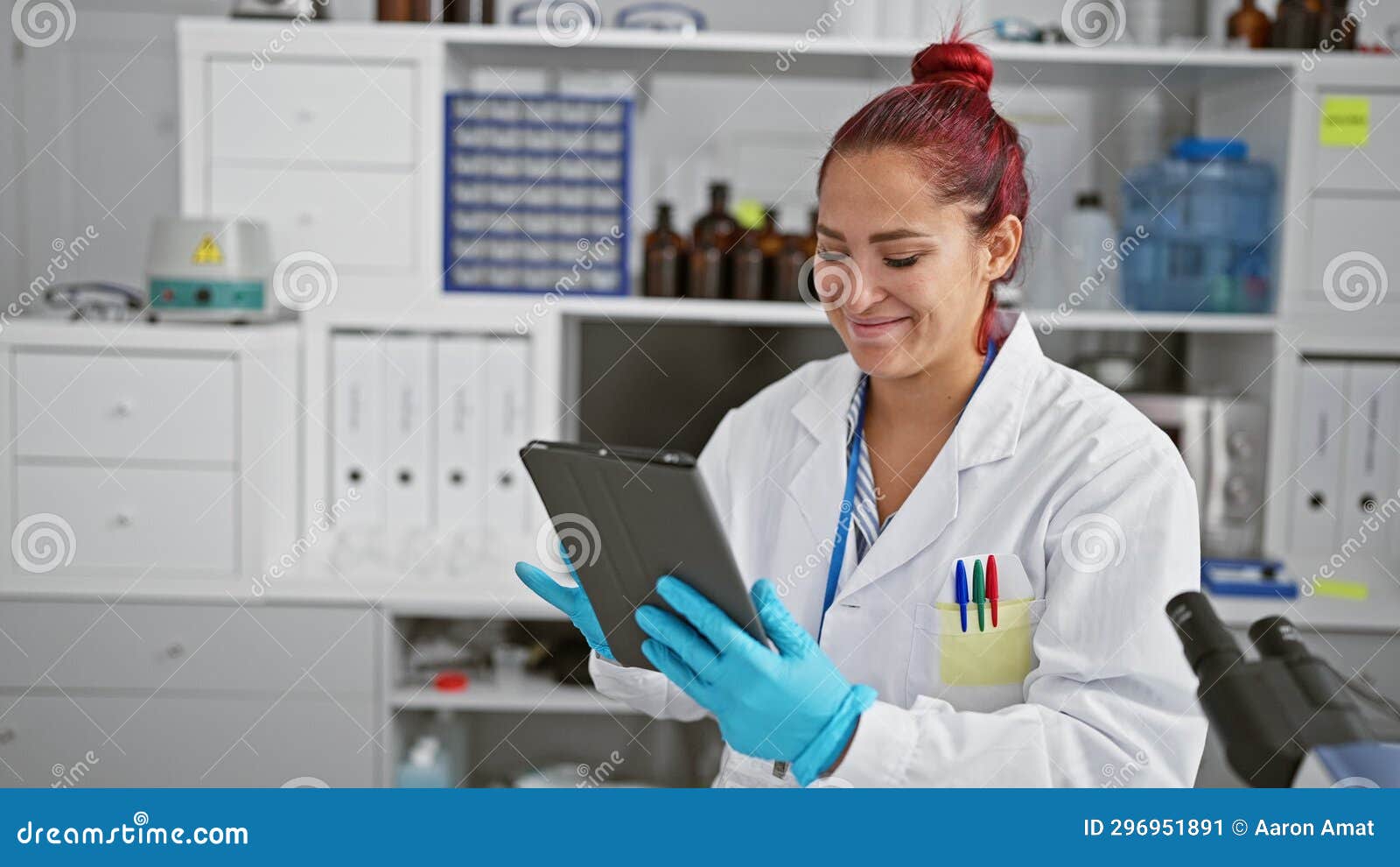 Smiling Young Redhead Scientist Woman Delightfully Making Strides In Science Research Using