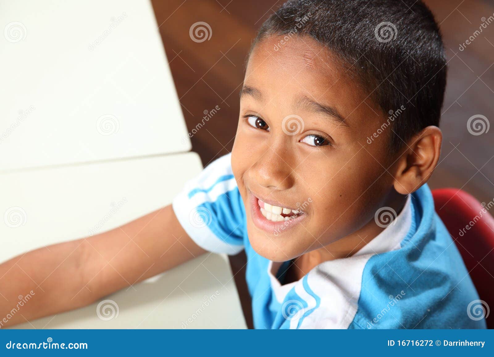 Smiling Young School Boy 9 at His Classroom Desk Stock Photo - Image of ...