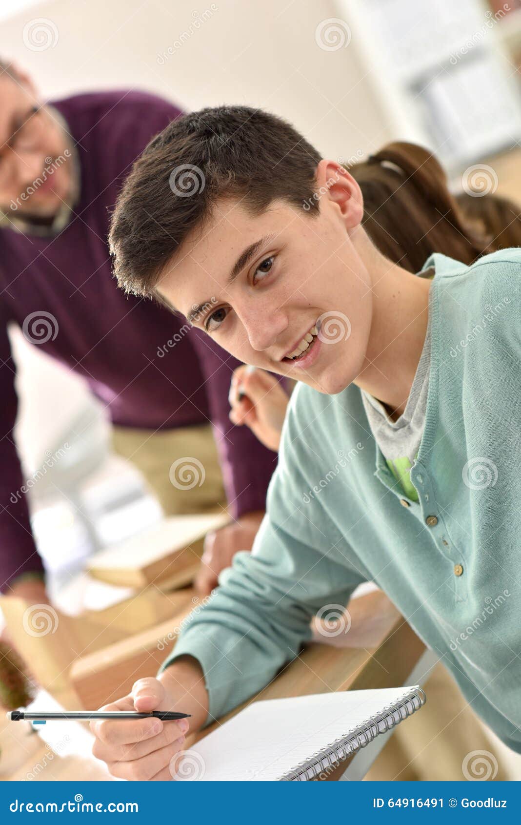 Smiling Young Student Attending Class Stock Image - Image of young ...
