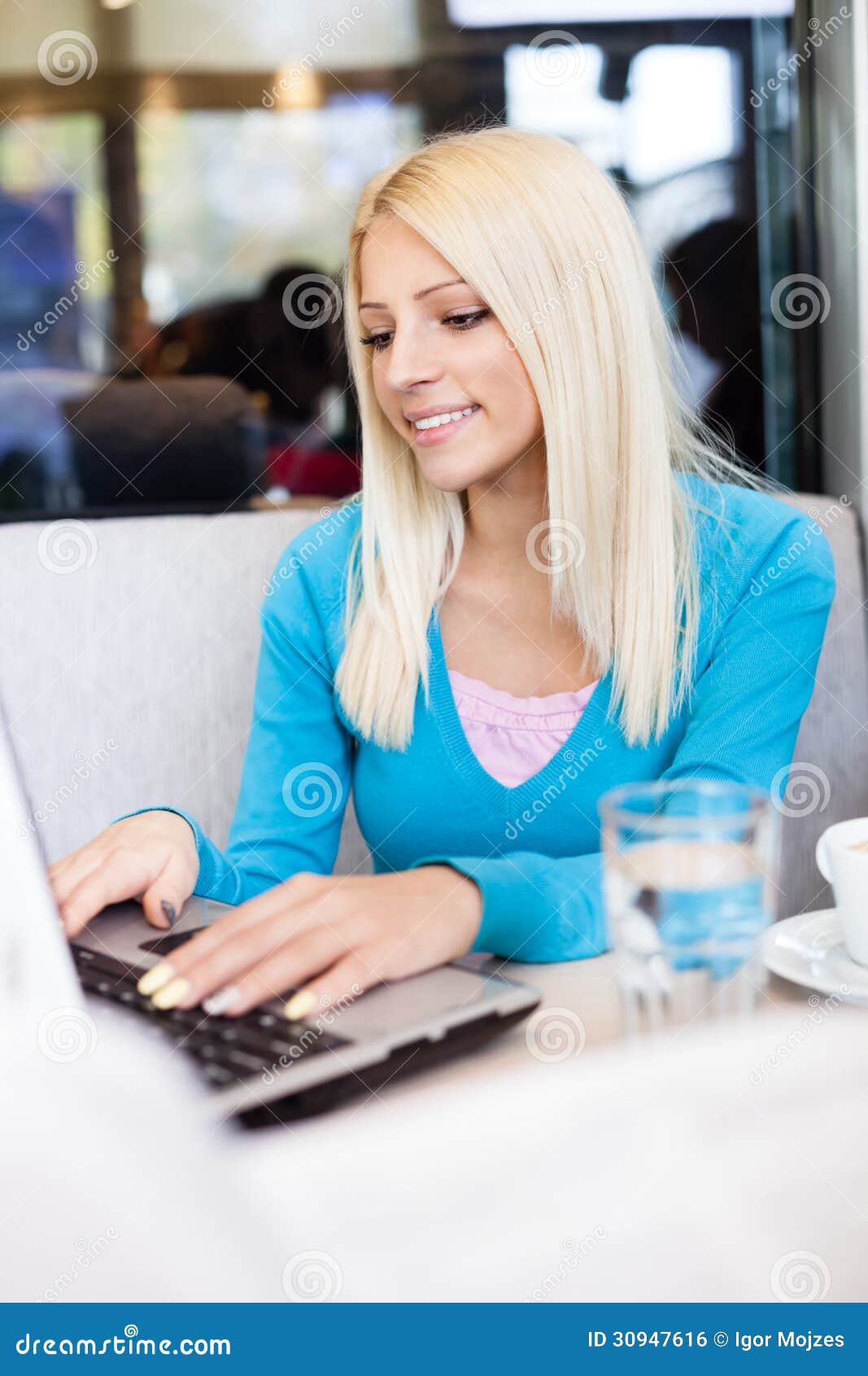 Smiling Young Student in Cafe with Laptop Stock Photo - Image of ...