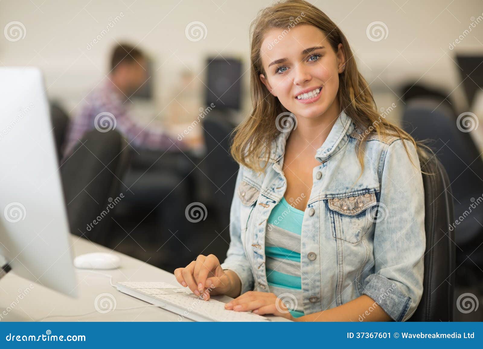 Smiling Young Student Studying in the Computer Room Stock Image - Image ...