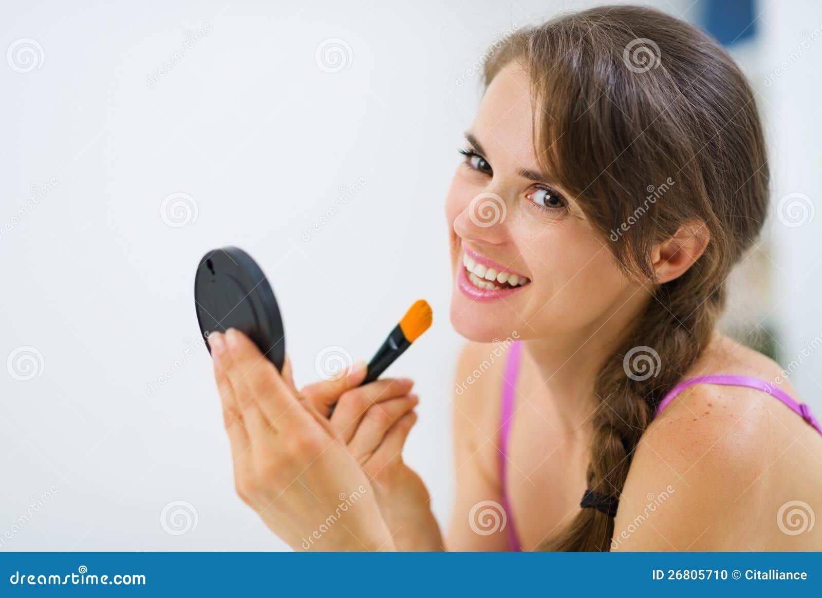 Smiling Young Woman Applying Makeup Stock Photo - Image of life ...