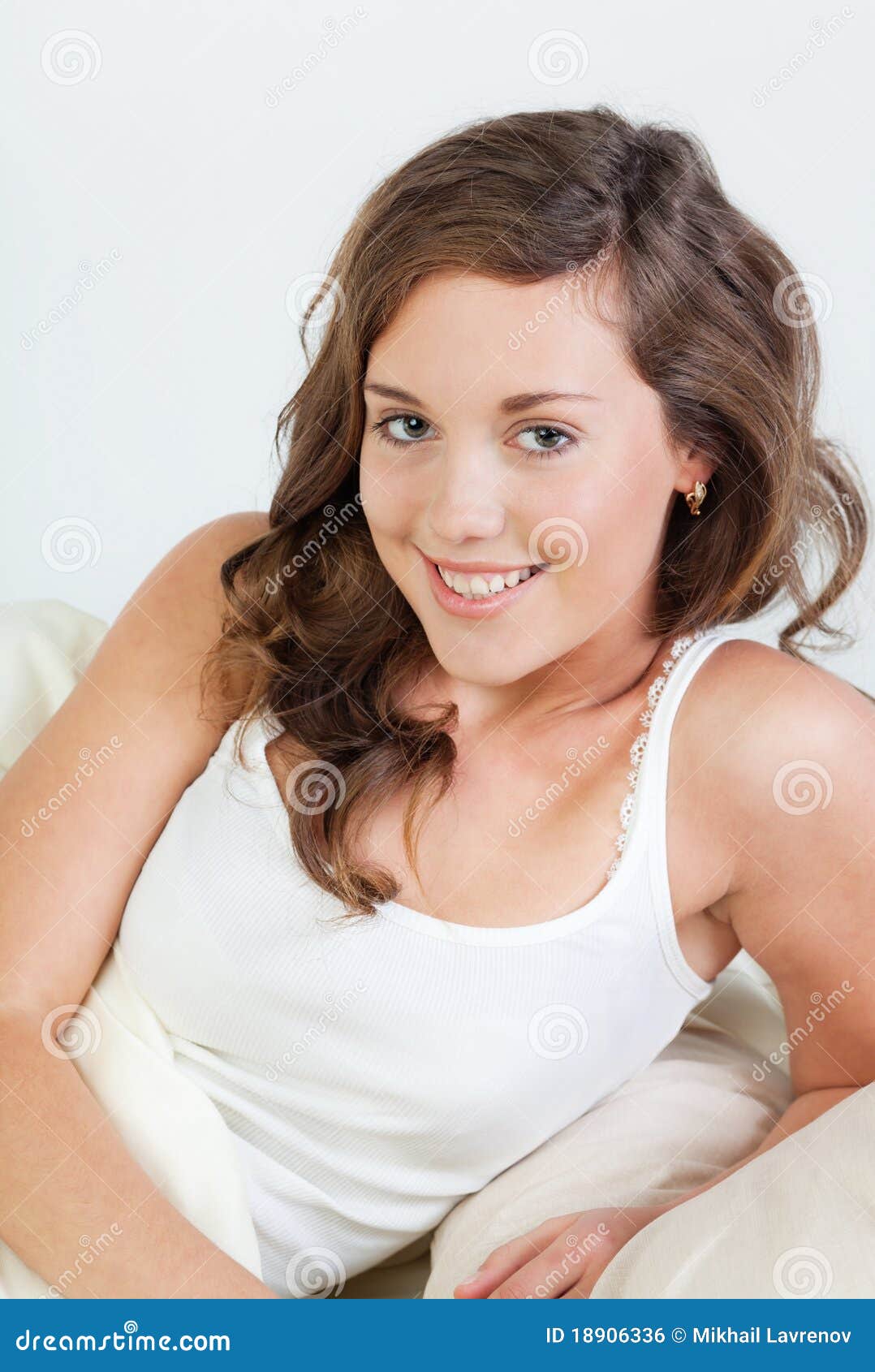 Smiling young woman in bed stock photo. Image of sensual - 18906336