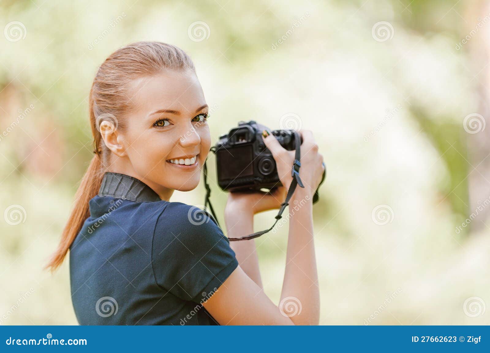 Smiling Young Woman with Camera Stock Image - Image of beauty, elegance ...