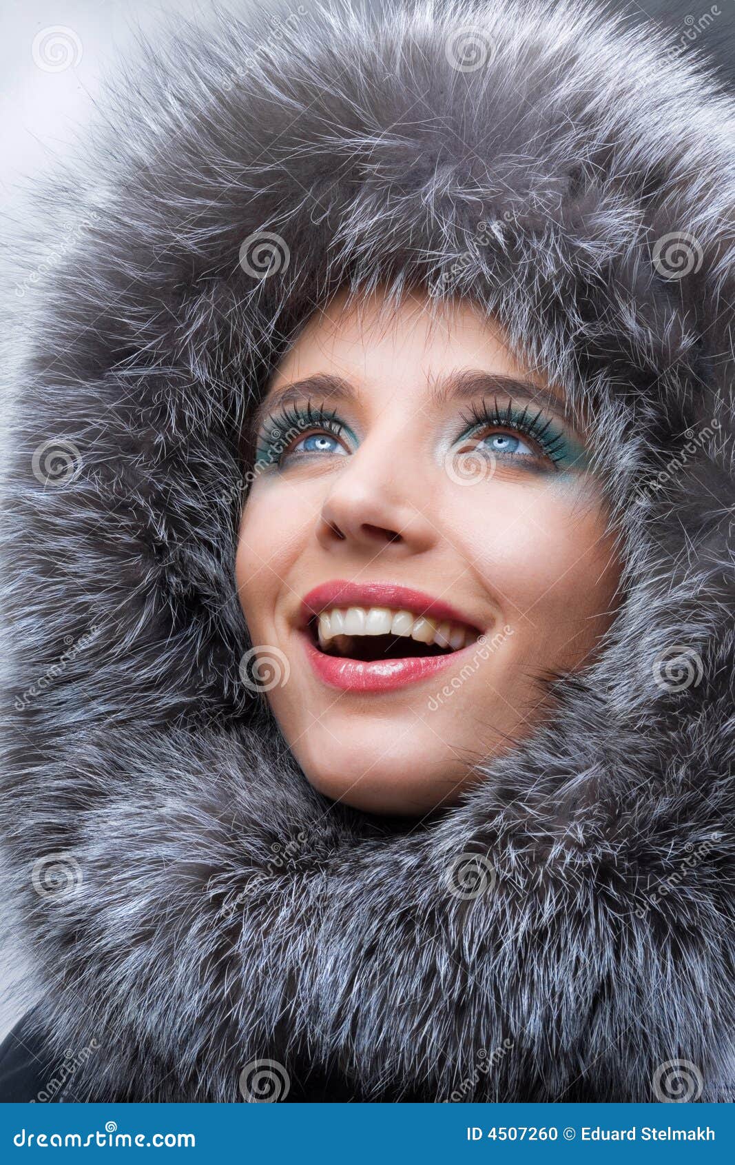 Smiling Young Woman with a Fur Hood Stock Photo - Image of female, lady ...