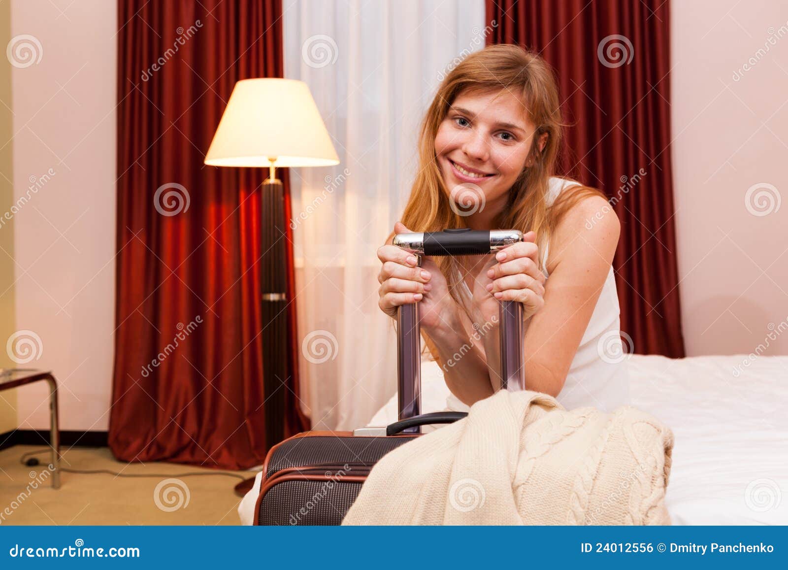 Smiling Young Woman in Hotel Stock Photo - Image of luggage ...
