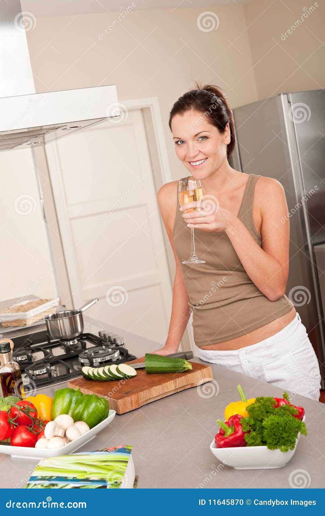 Smiling Young Woman in the Kitchen Stock Photo - Image of people ...