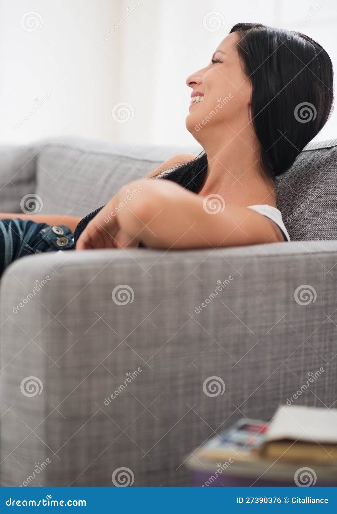 Smiling Young Woman Laying on Couch Stock Photo - Image of living ... Smiling Young Woman Laying on Couch Stock Photo - Image of living ...