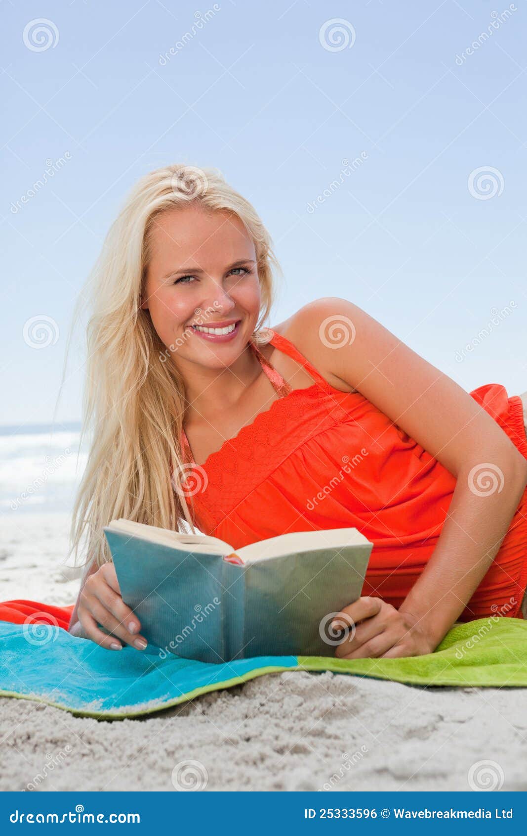 Smiling Young Woman Lying on the Side Stock Photo - Image of beautiful ...
