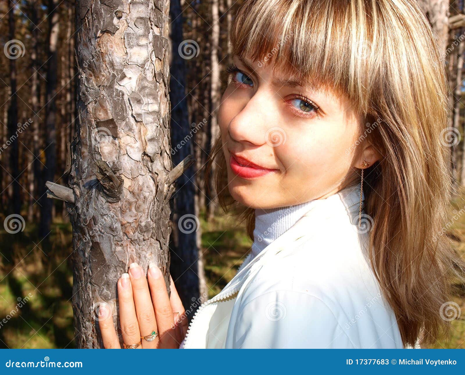 Smiling Young Woman and a Pine Tree Stock Image - Image of season ...