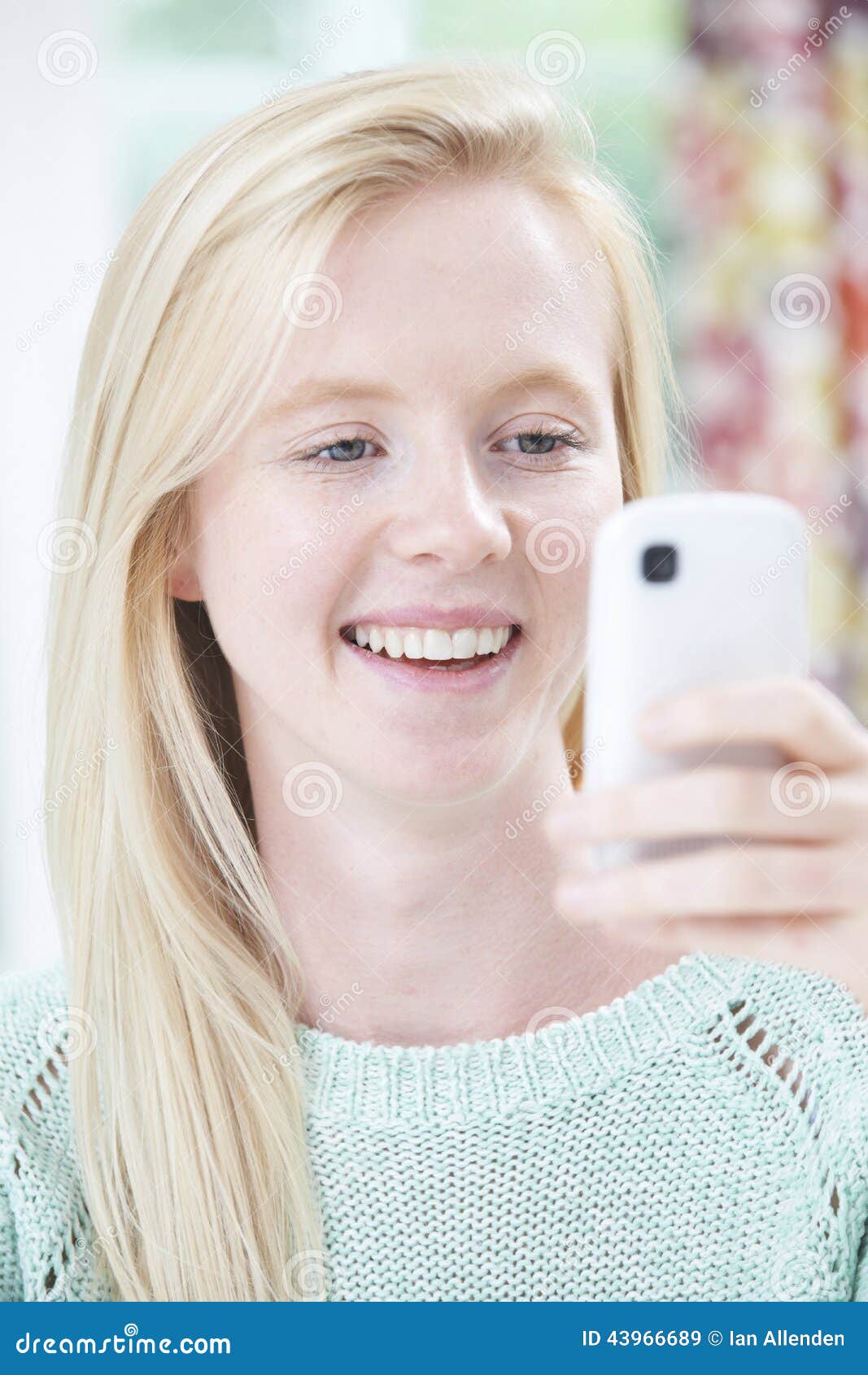 Smiling Young Woman Reading Text Message Stock Image - Image of teen ...