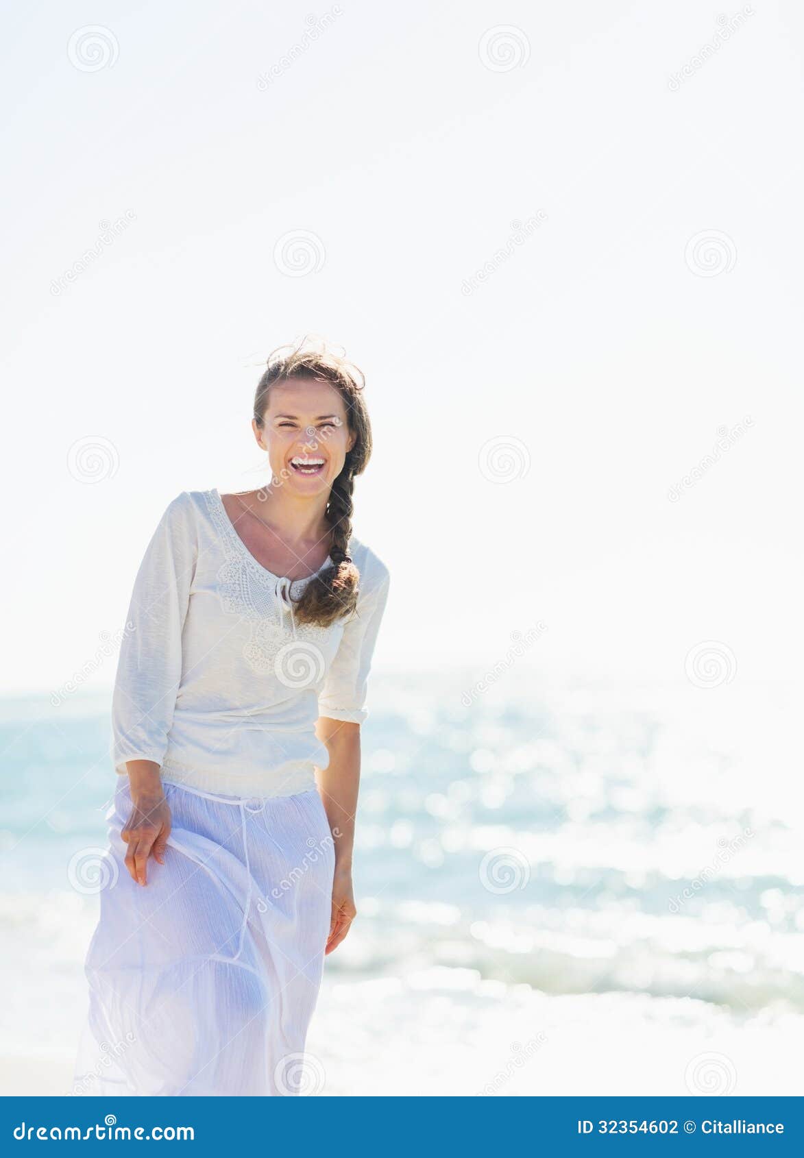 Smiling Young Woman at Seaside Stock Photo - Image of beautiful, pretty ...