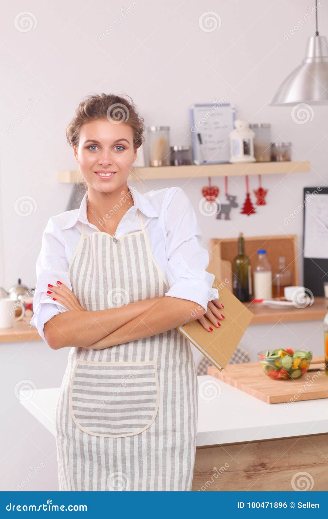 Smiling Young Woman Standing in the Kitchen Stock Photo - Image of ...