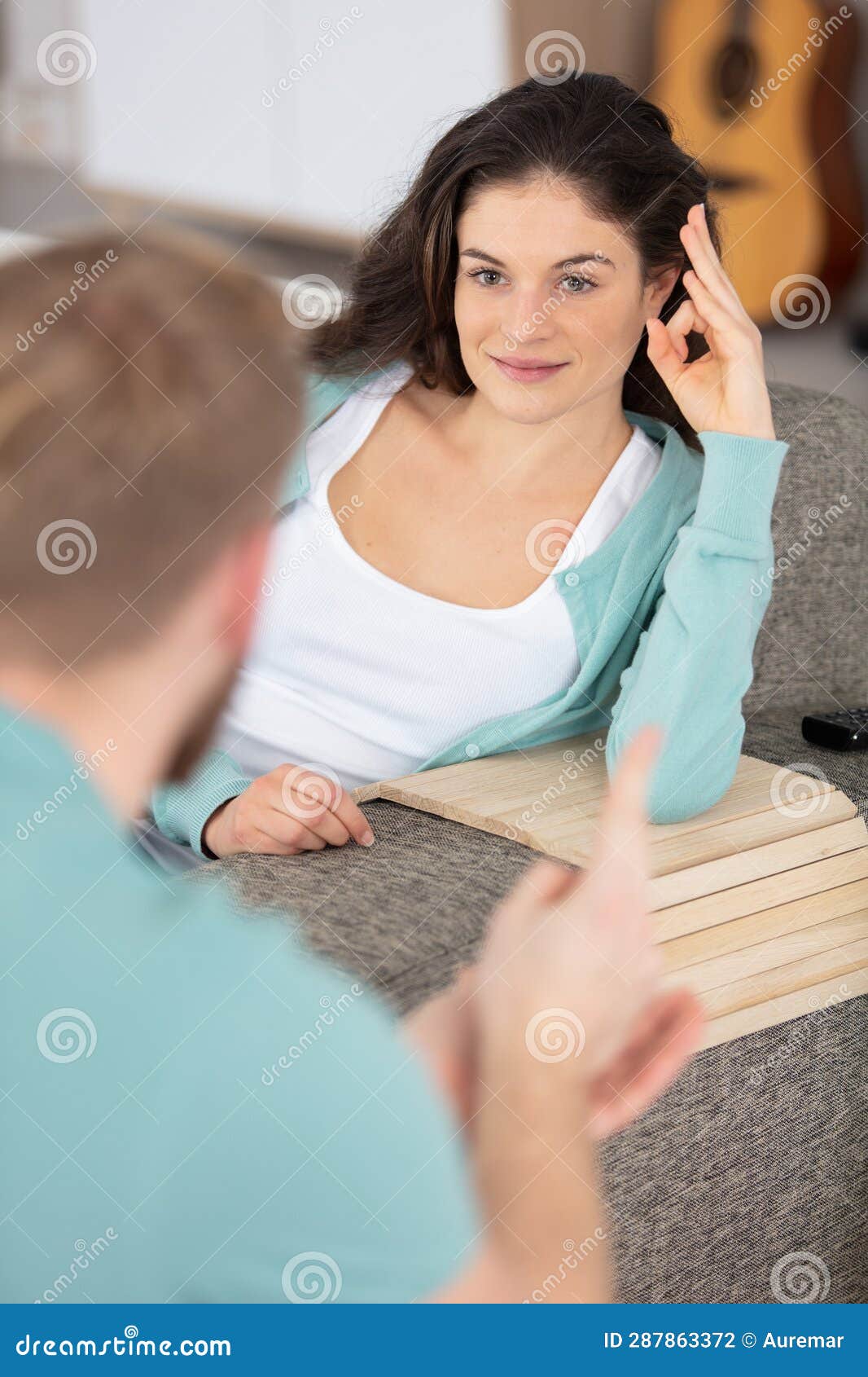 Smiling Young Woman Talking Using Sign Language with Boyfriend Stock ...