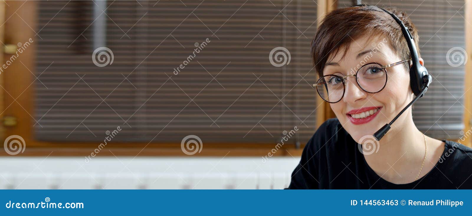 Smiling Woman Using an Headset Stock Image - Image of headset ...