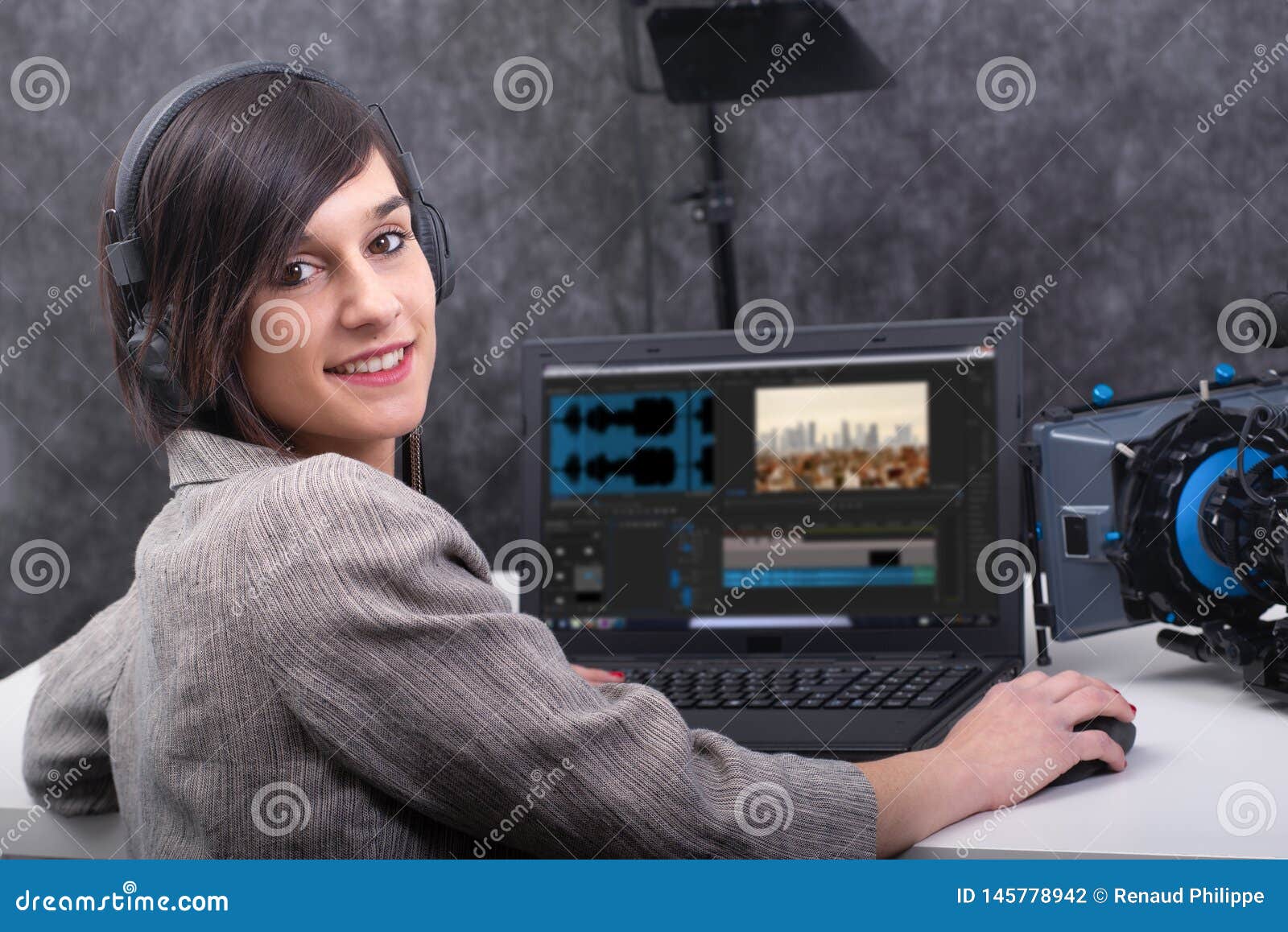Smiling Young Woman Video Editor Working in Studio Stock Photo - Image ...