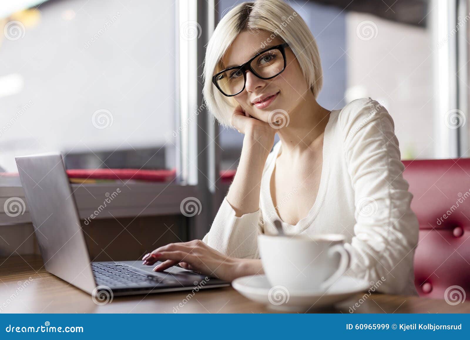Smiling Young Woman Working with Laptop Computer in Cafe Stock Image ...