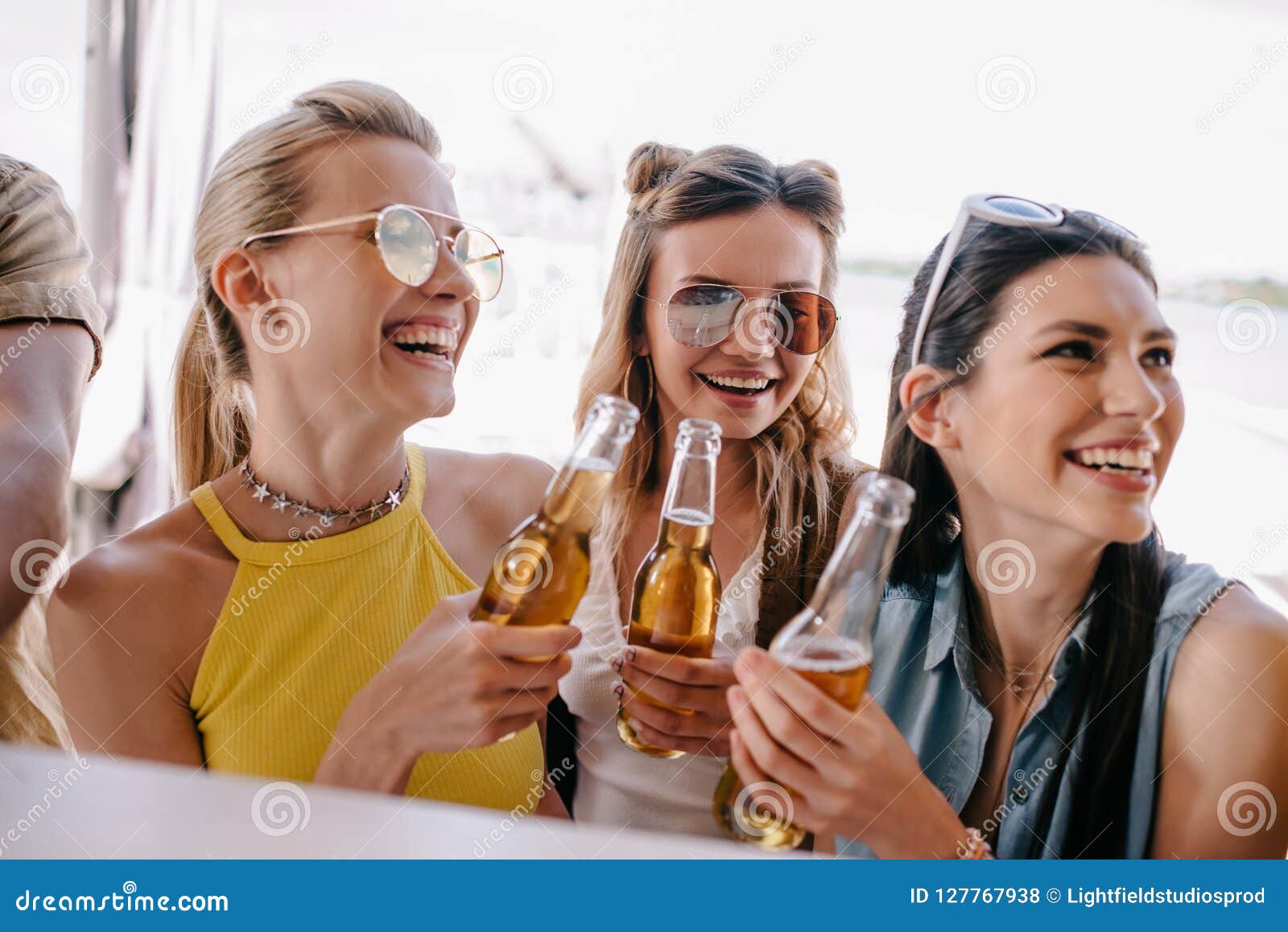 Smiling Young Women Drinking Beer Stock Photo - Image of drink ...