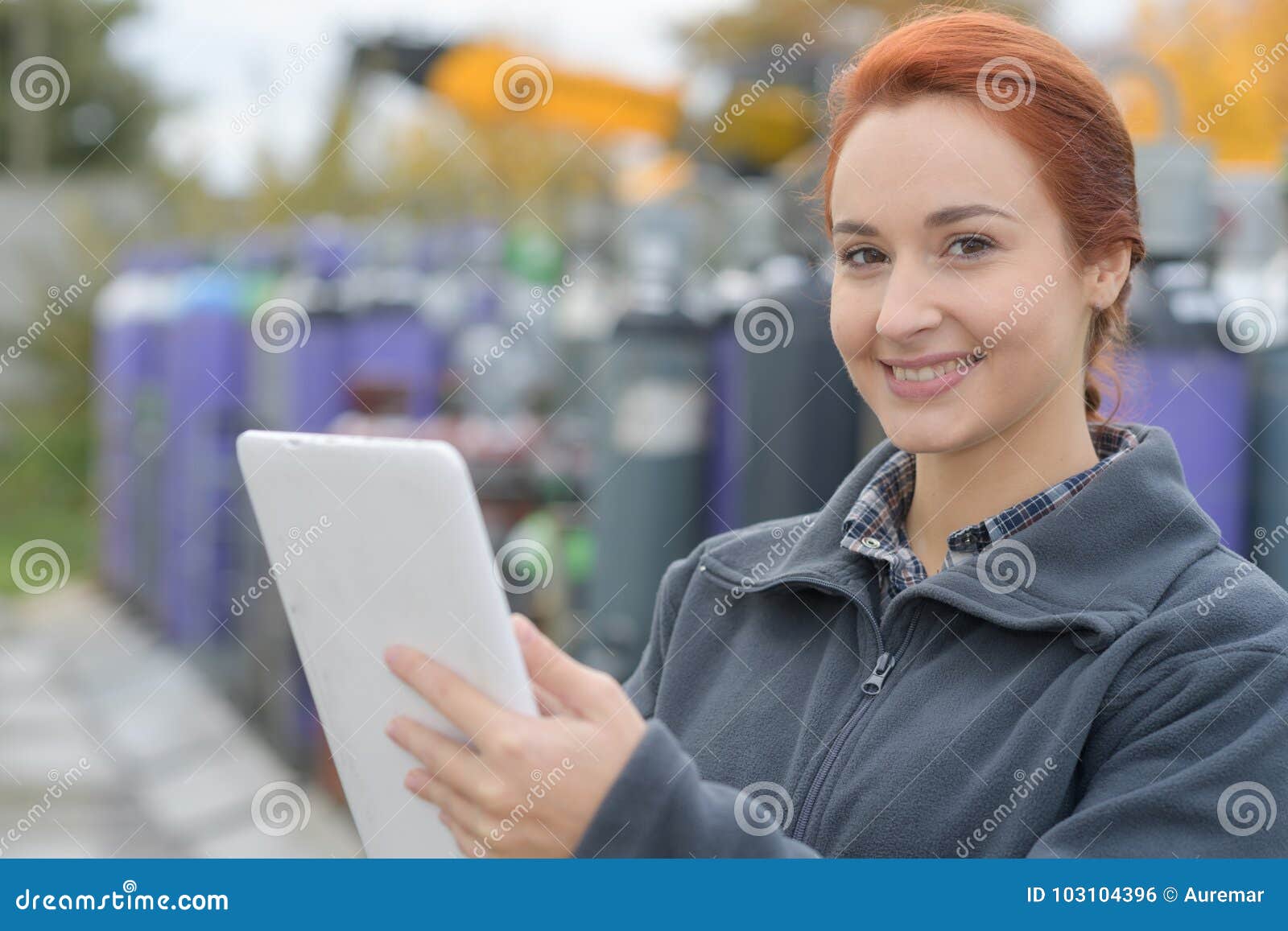 Smiling Young Worker Using Tablet Pc Outside Office Stock Photo - Image ...