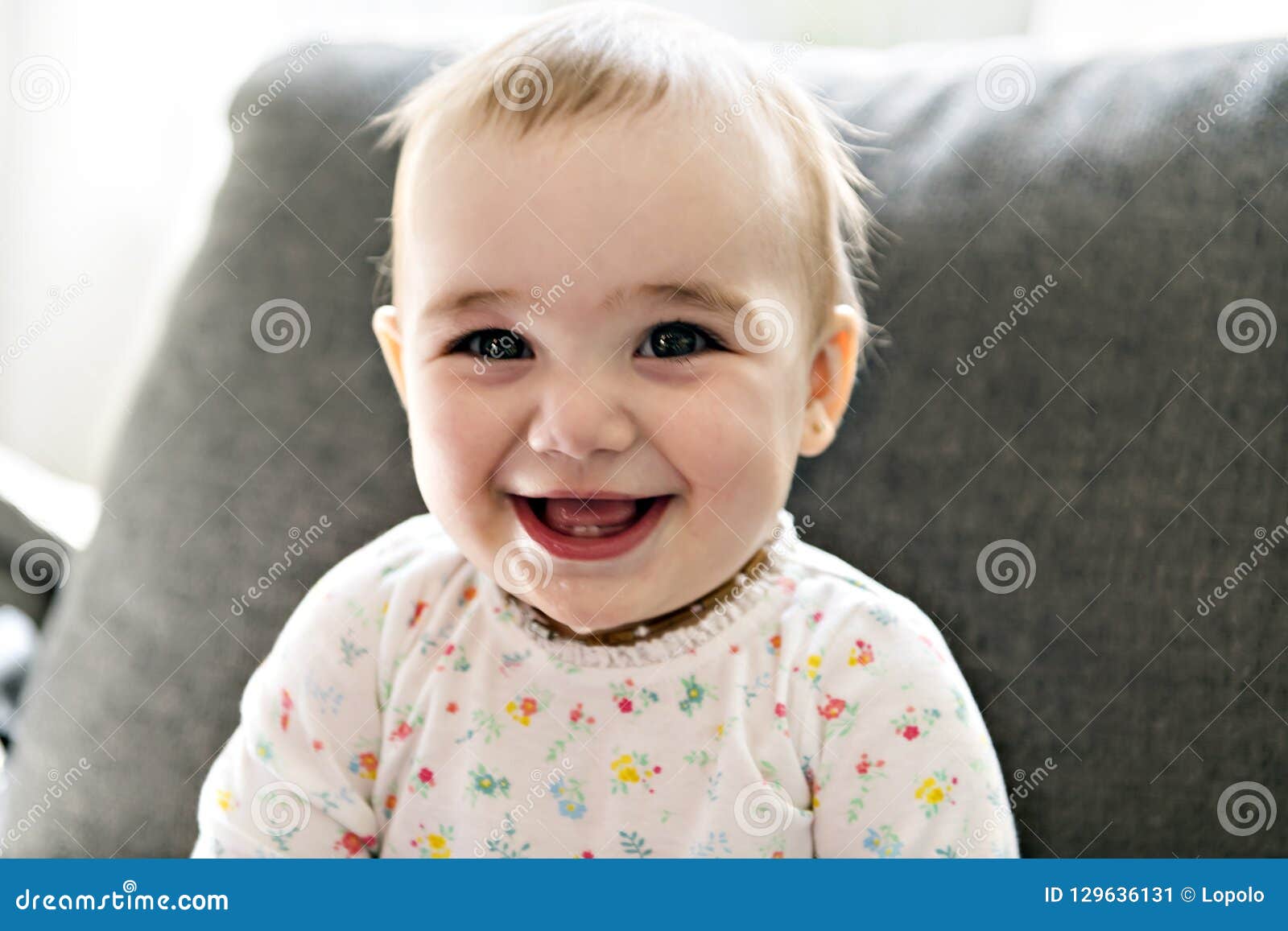 Smilling Baby With Laptop On A Sofa Stock Photo | CartoonDealer.com ...