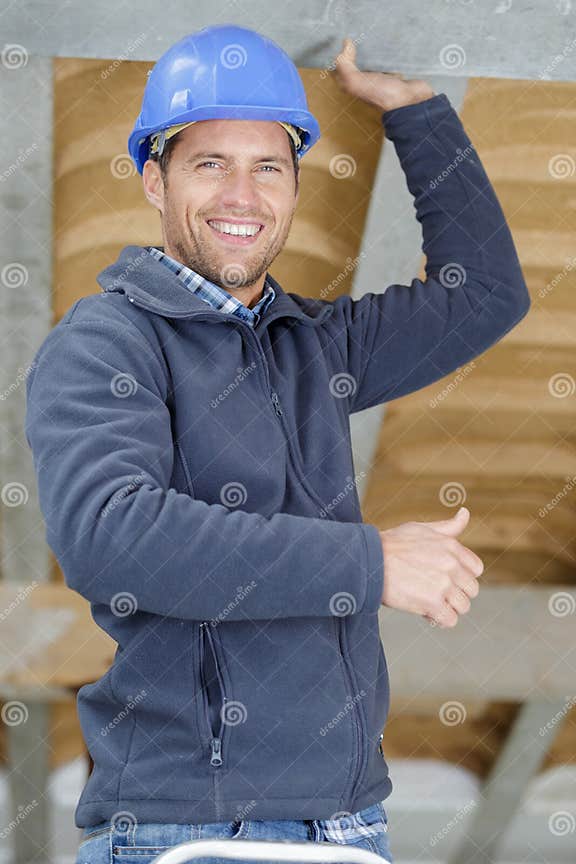 Smilling Builder Fixing Ceiling Stock Image - Image of master, vertical ...