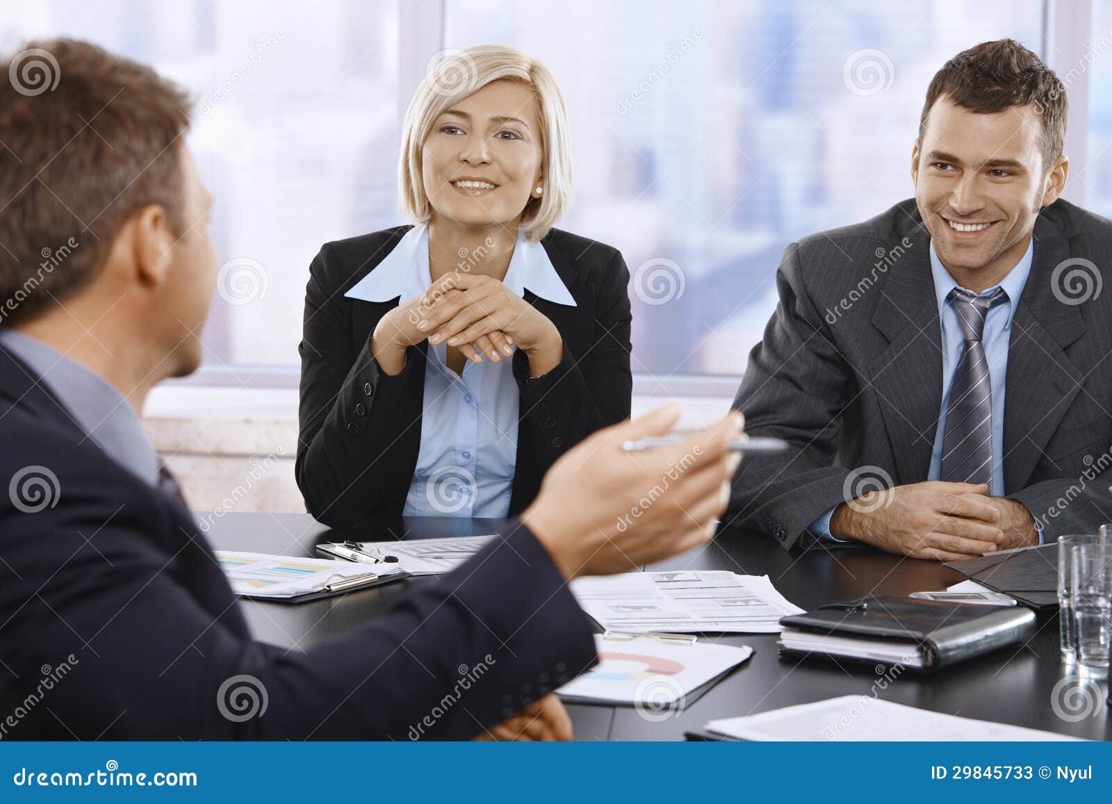 Smiling businesspeople stock image. Image of discussing - 29845733