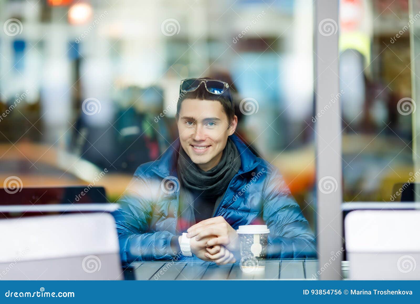 Smilling Man with a Cup of Coffee in a Cafe. Stock Photo - Image of ...