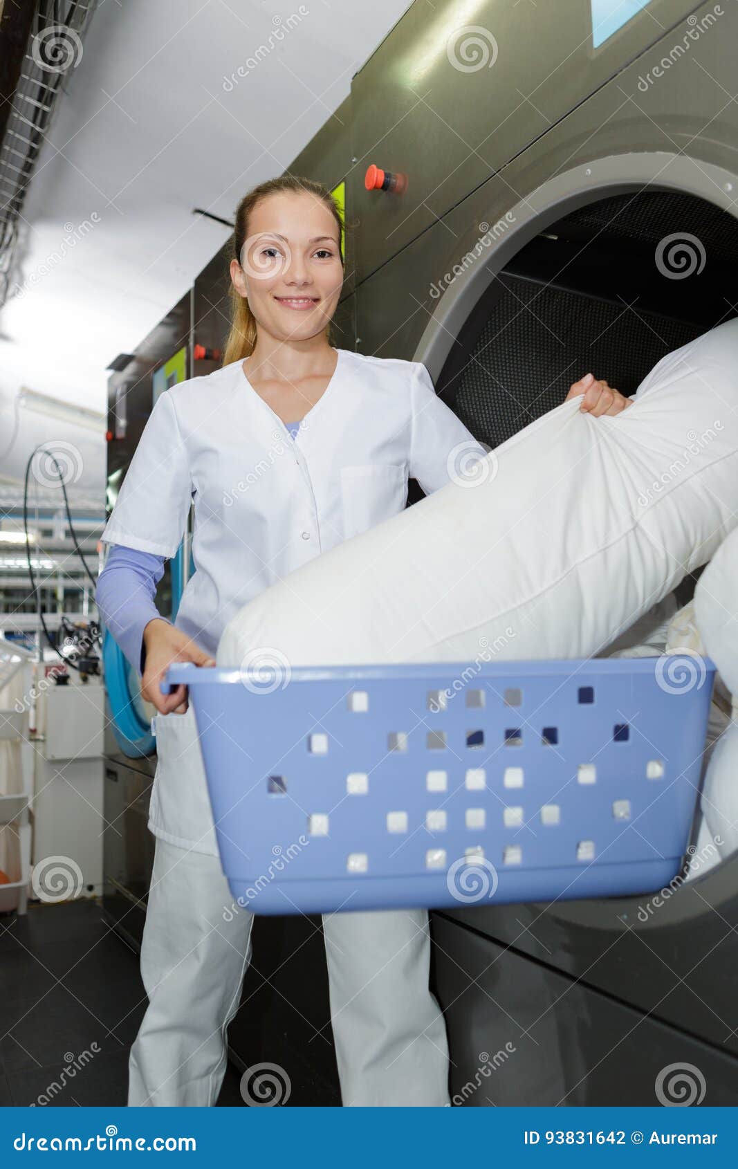Smily Woman Working at Industrial Laundry Stock Photo - Image of ...