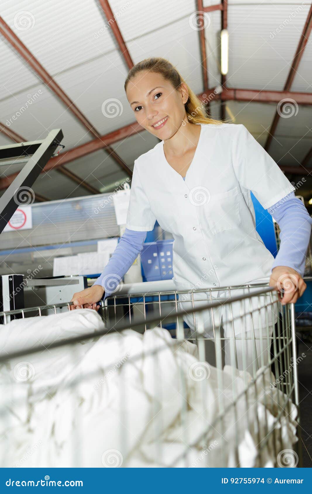 Smily Woman Working at Laundry Stock Photo - Image of servicing, cloth ...