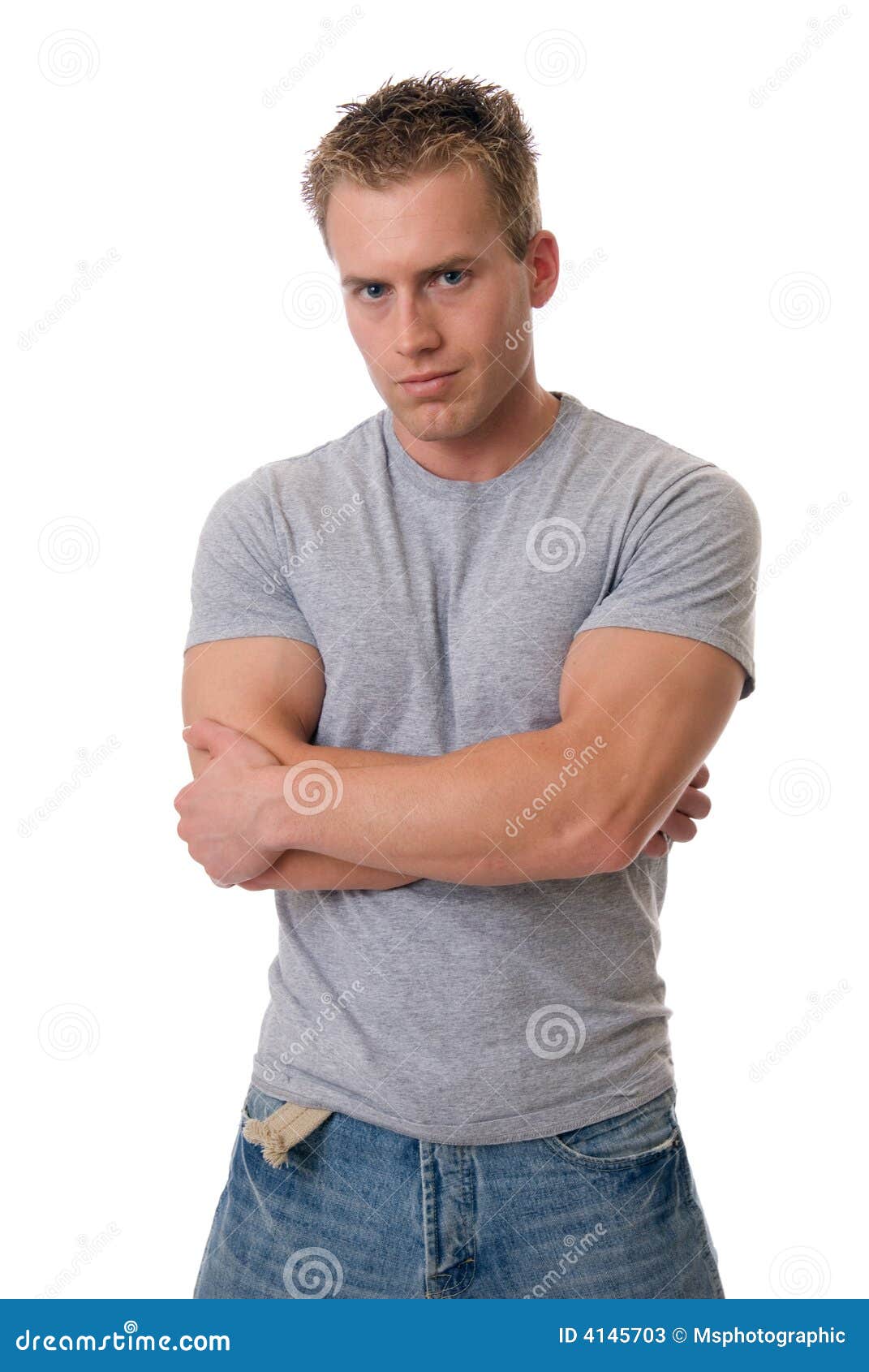 Smirk stock image. Image of biceps, jeans, shirt, cocky - 4145703