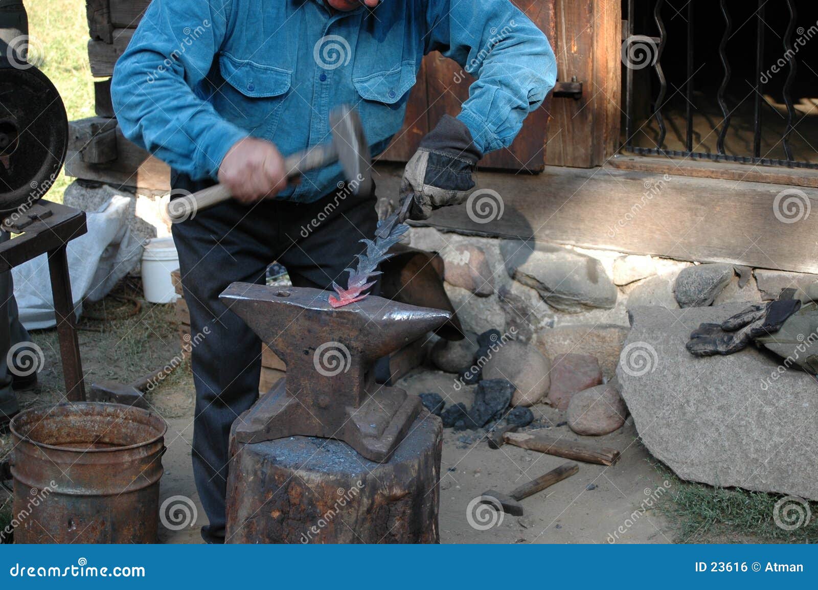 Smith at Work stock photo. Image of anwil, workshop, shirt - 23616