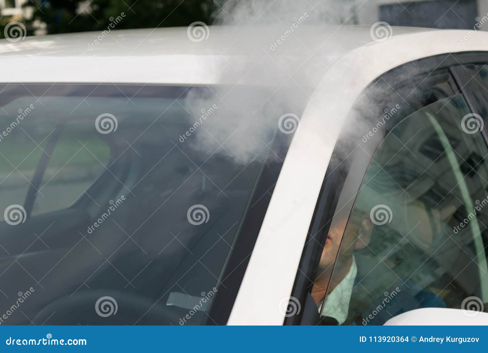 Smoke from a Cigarette Comes Out of a White Car Window Stock Photo ...