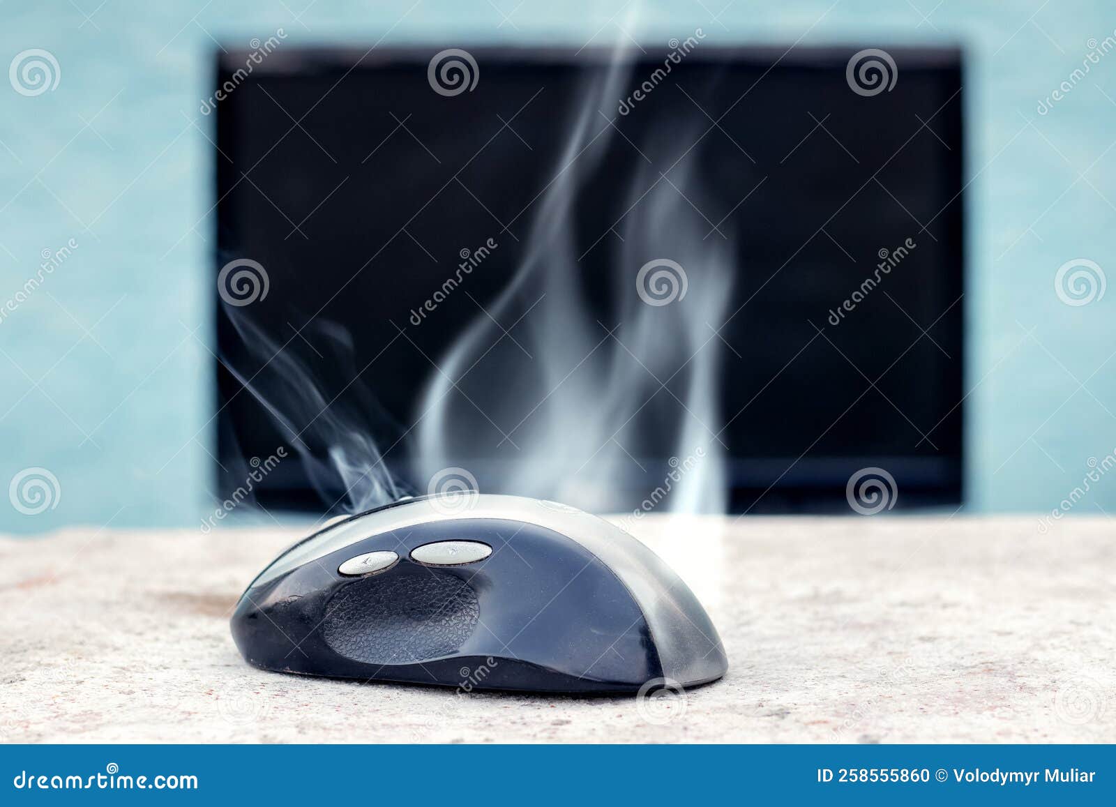 Smoke is Coming from the Computer Mouse Near the Computer Due To a ...