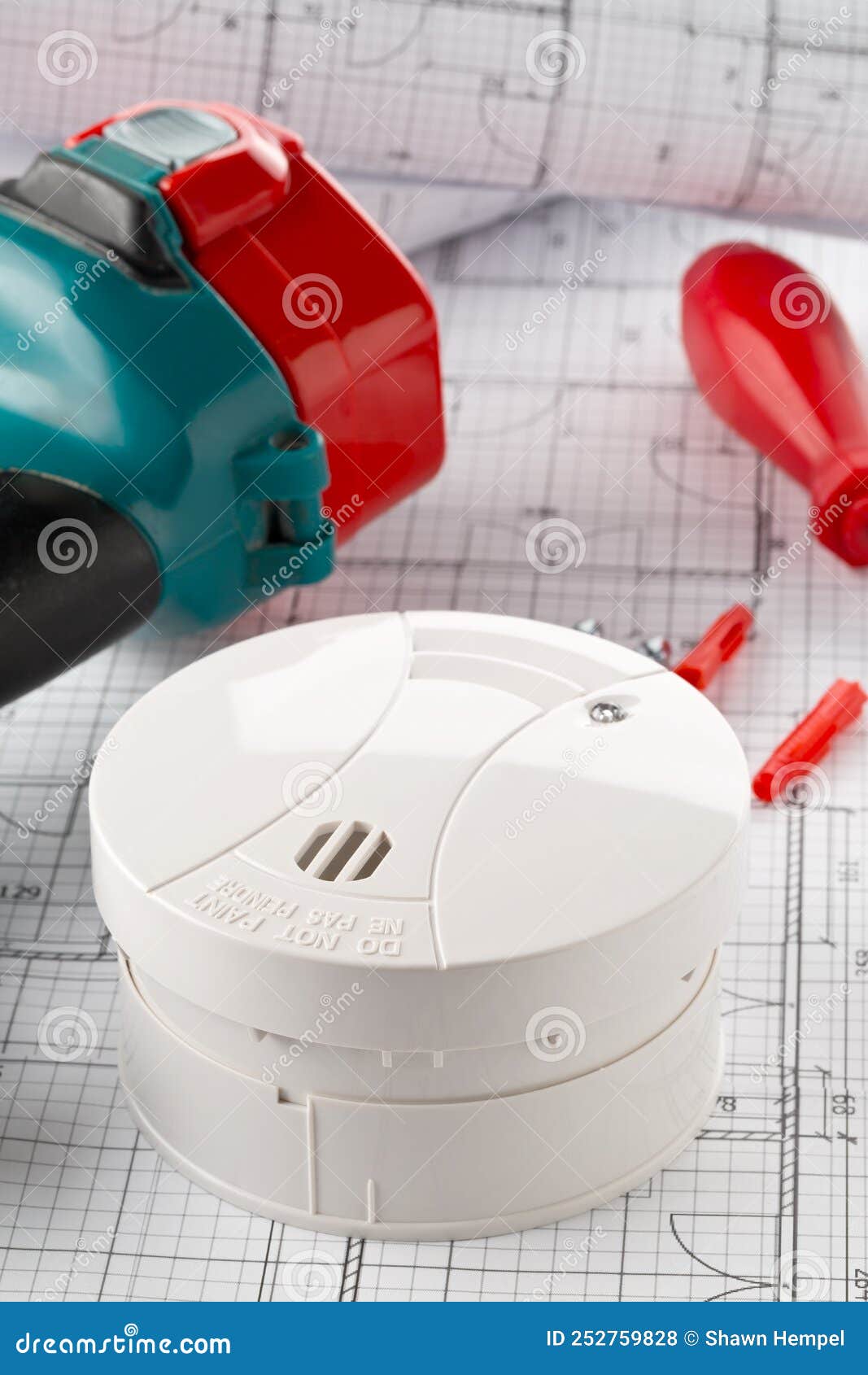 Smoke Detector or Fire Alarm Sensor on White Architectural Plans ...