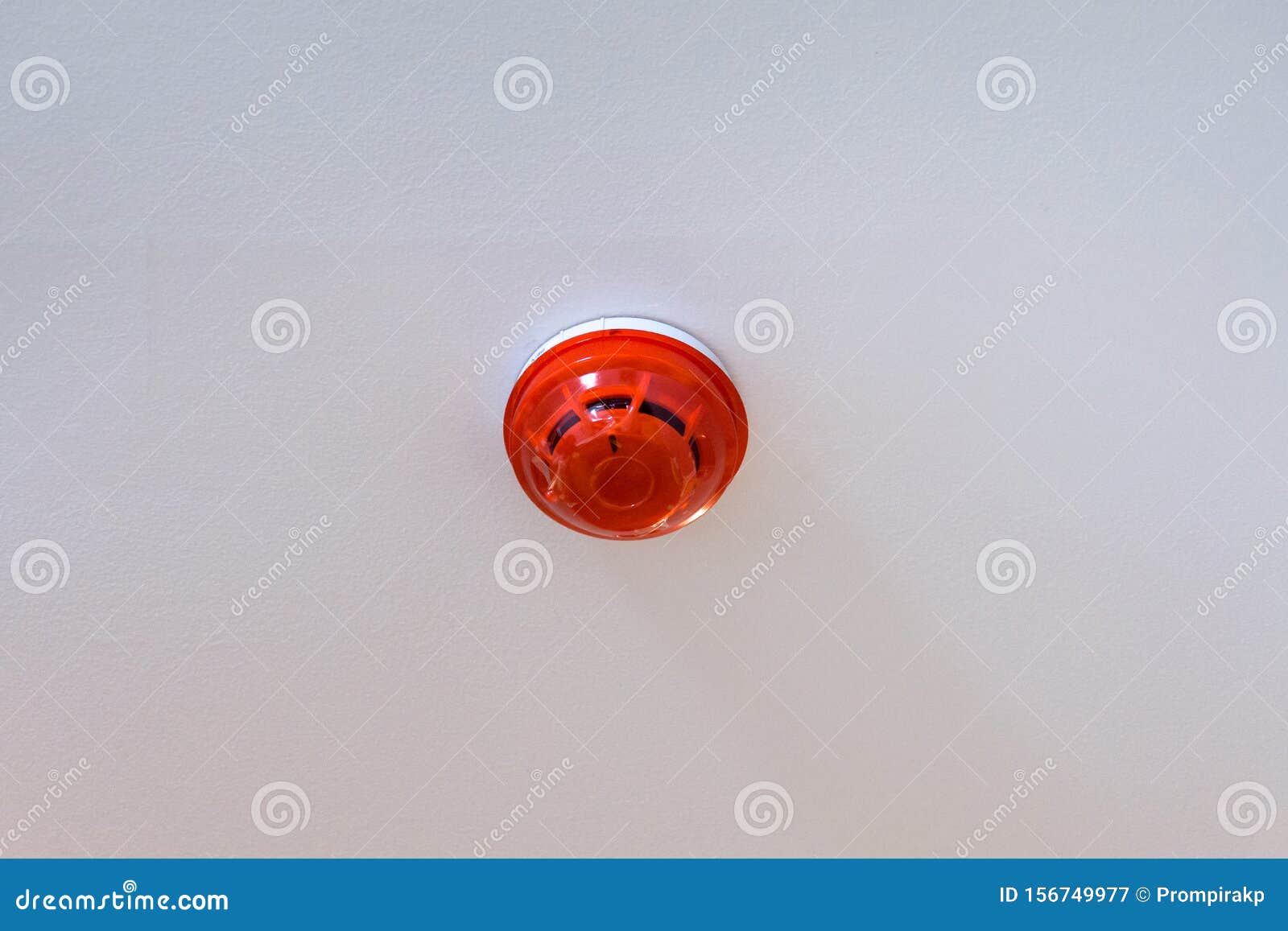 Smoke Detector with Plastic Cap Cover Mounted on Ceiling of the ...